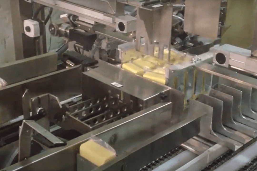 HMPS Wraparound Casepacker Packing Cheese Block - Propac