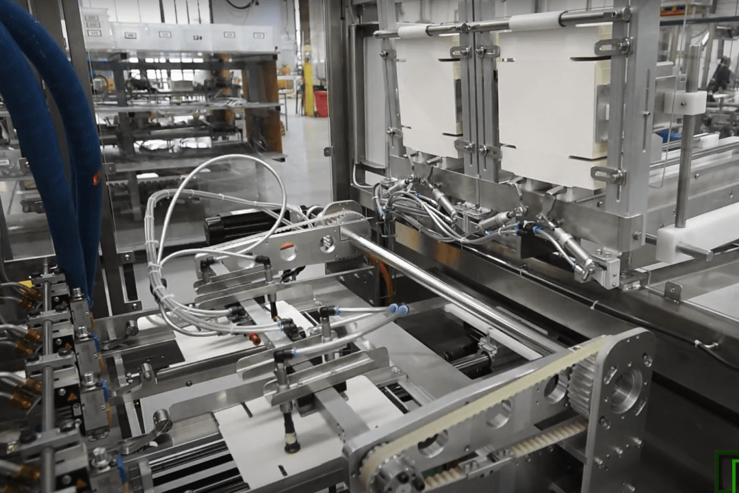 Tray Former Leading to Hand Loading Station - Propac