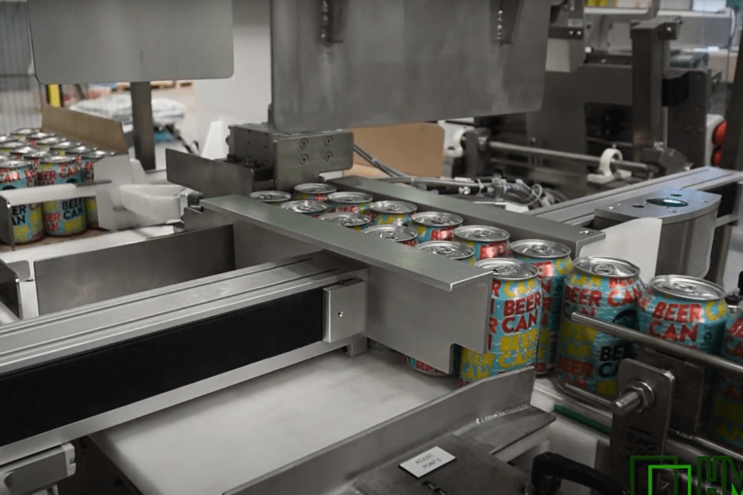 HMPS Wraparound Casepacker Packing Cans and Bottles of Beer - Propac